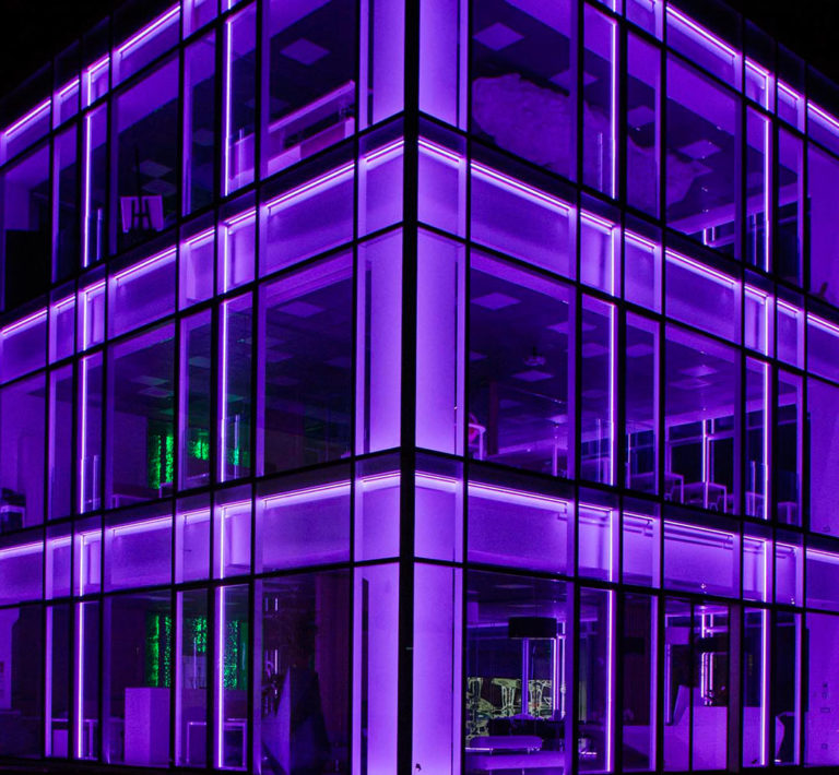 purple office building | PCG